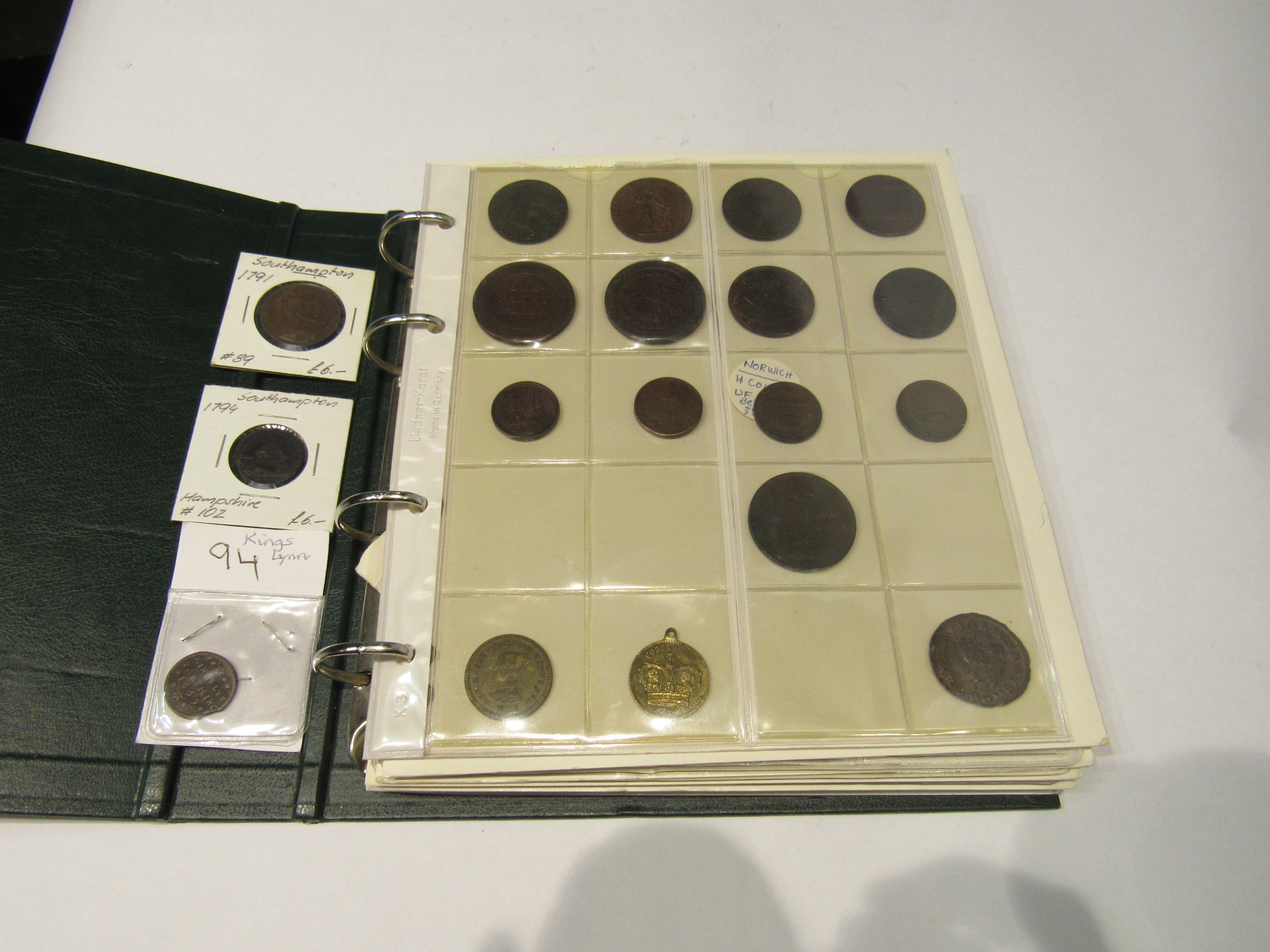 An album of copper & bronze British coins and tokens including 18th ...
