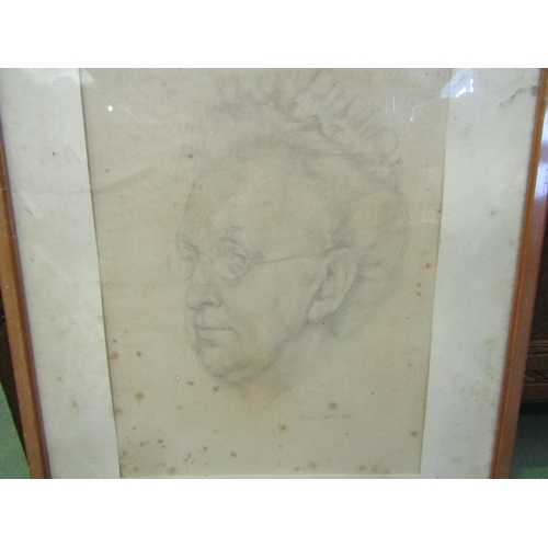 A pencil sketch portrait of female wearing spectacles, pencil signed ...