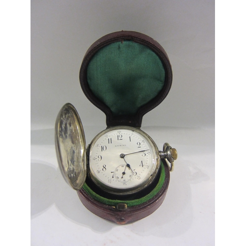 A Leonidas Precision silver pocket watch, engraved decoration in fitted ...