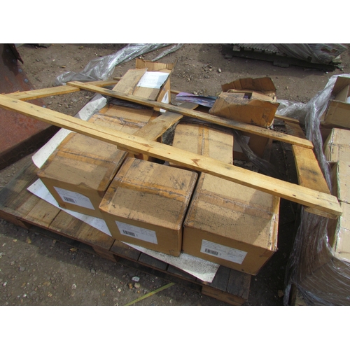 A pallet of boxed unused books including educational books