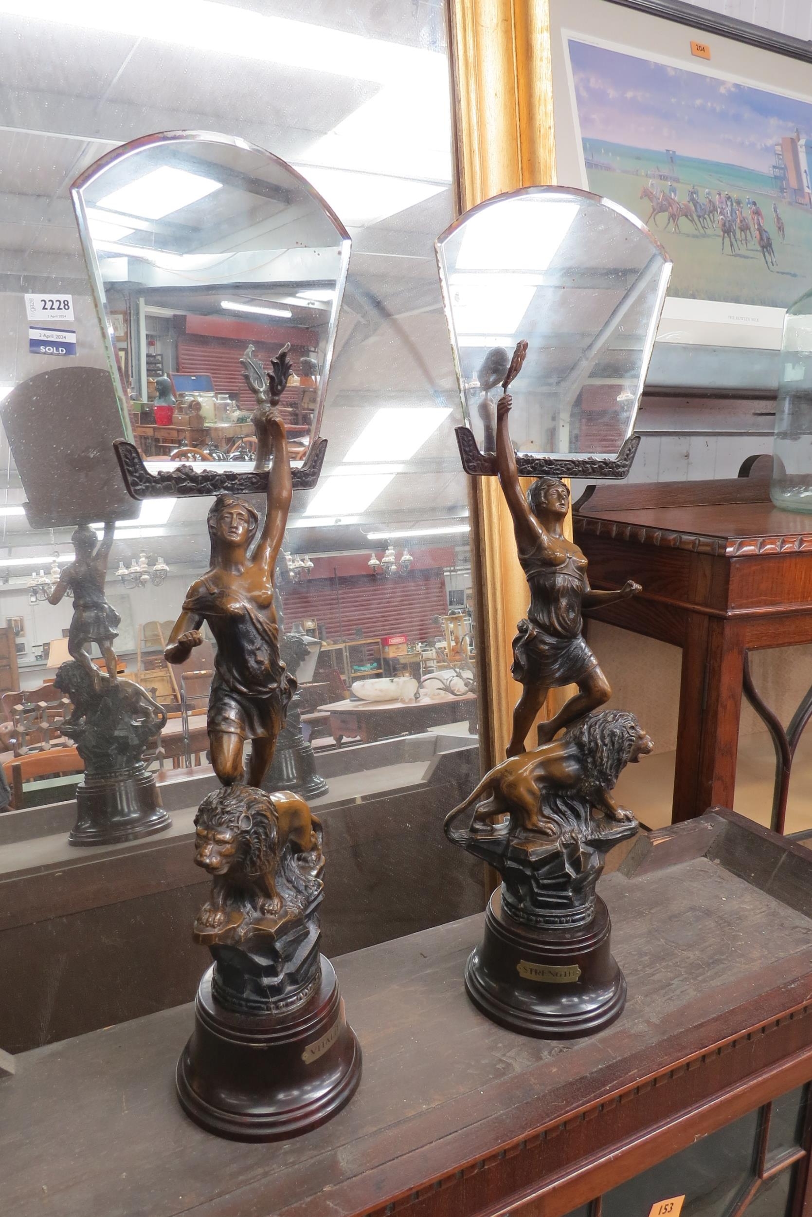 A pair of bronze finished spelter figures with mirrors - Strength ...