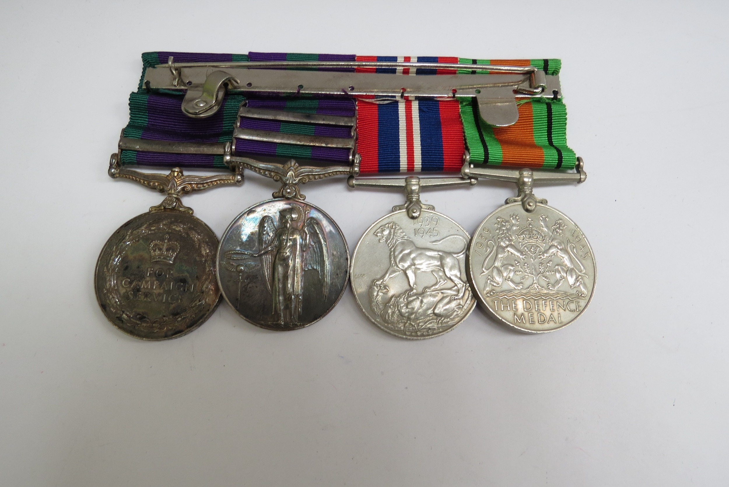 A WWI and later medal group of four consisting of Defence Medal, War ...