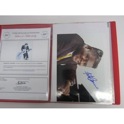 Rock N Roll autographs- A folder containing twelve hand signed items ...