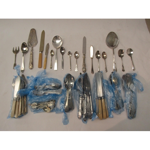 A box containing a quantity of cutlery including cased examples