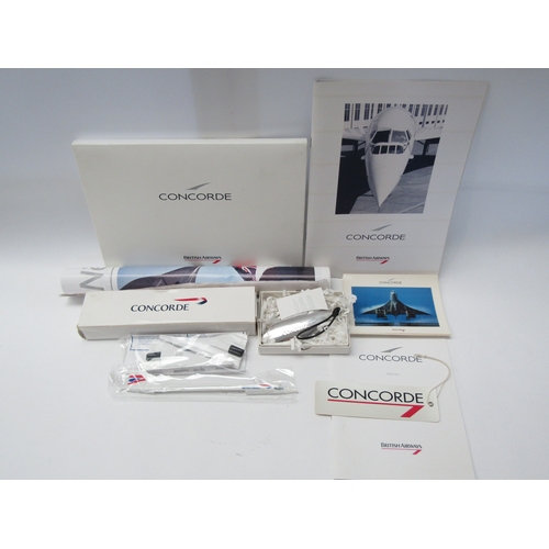 A collection of Concorde memorabilia to include silver spirit tag ...