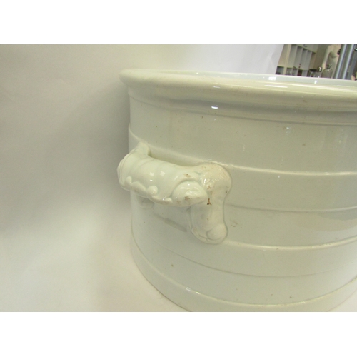 A Copeland & Garrett cream glazed pottery foot bath with twin handles ...