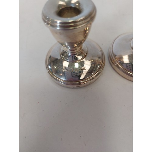 A pair of silver candlesticks. Birmingham 1985, Lawrence R. Watson & Co ...