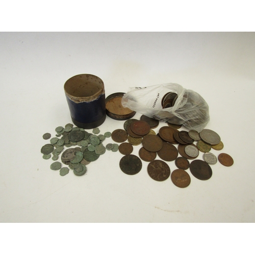 A collection of coins ranging from Roman metal detector finds and Elizabeth I hammered silver sixpen