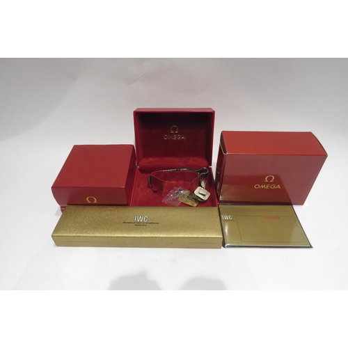 Three wristwatch boxes, IWC and Omega including a stainless steel strap