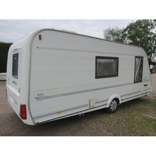 A Compass Rallye four-berth caravan - keys in office