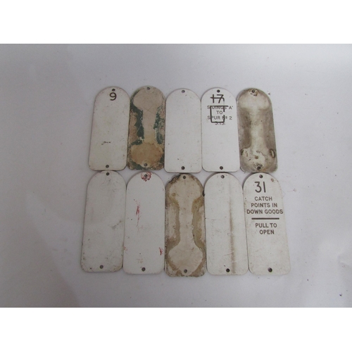 A box of traffolyte signal box lever plates