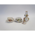 Three Victorian Meissen miniatures - two cups and saucers and one scent ...
