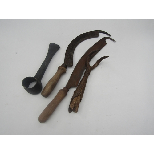 Two turnip hooks, hoe head and peat titch crook