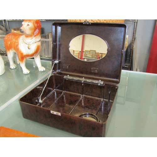 A wooden waste basket and bakelite box