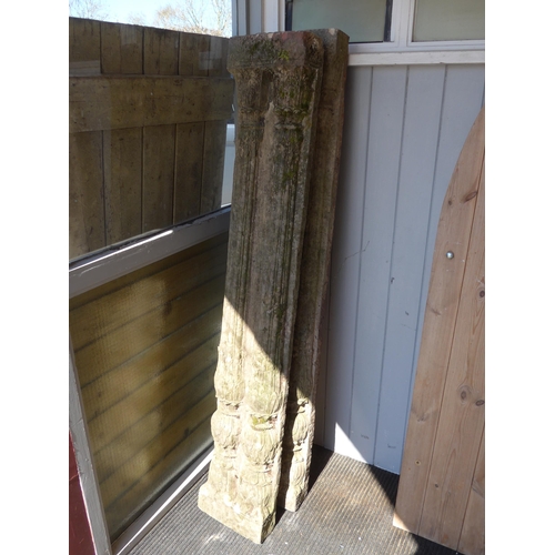 A near pair of weathered stone flat back reeded columns, 162 x 28cms ...