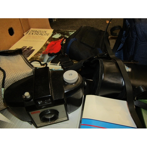 A box of mixed camera equipment including Olympus, Canon, lenses and ...