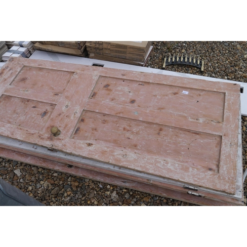 Four reclaimed wooden doors