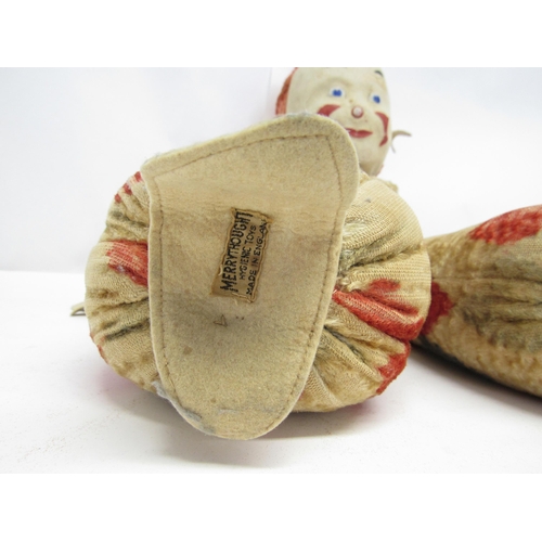 A careworn 1930s Merrythought clown, moulded cloth face with painted ...