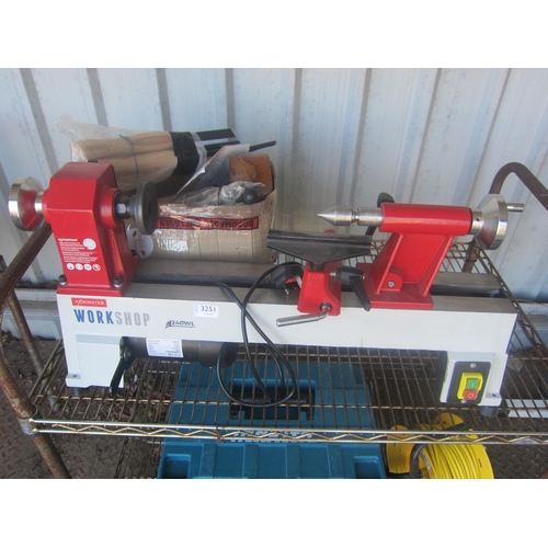 An Axminster workshop lathe with woodturning chisels, etc. DTI Failure ...