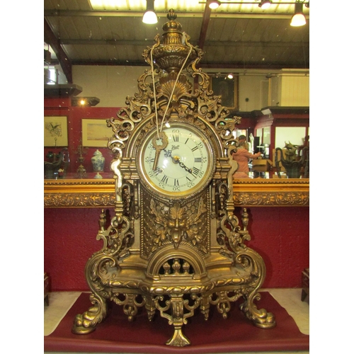 A large Italian ornate brass mantel clock by Walt, Roman dial with ...