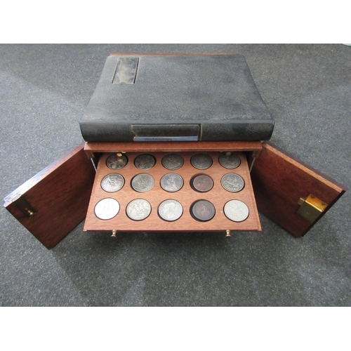A wooden coin cabinet with fourteen trays, most containing British and ...
