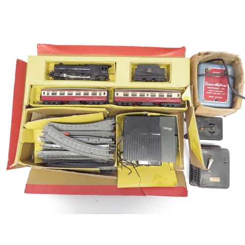 A Triang 00 gauge passenger train set comprising 4-6-2 locomotive ...