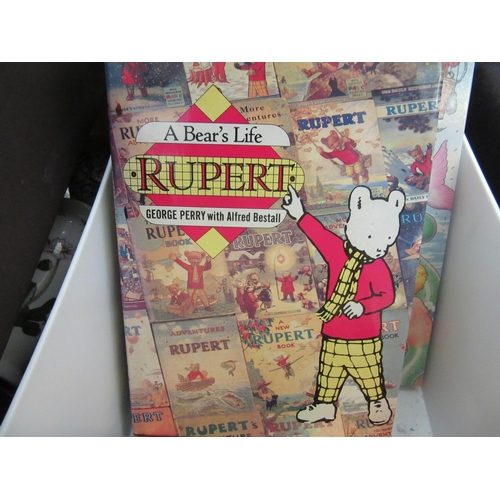 A collection of Rupert The Bear books and annuals etc.