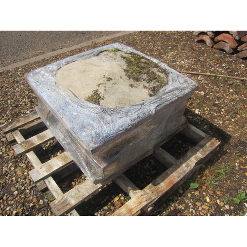 A pair of weathered composition gate post caps, 58cm x 58cm