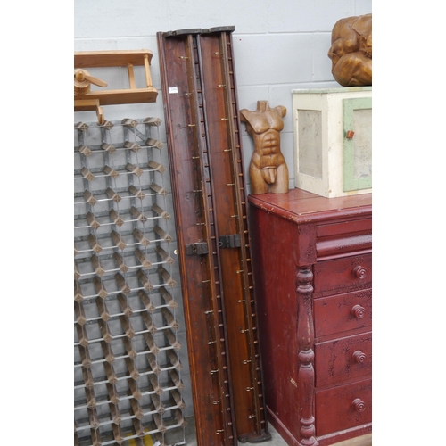 A pair of pine cup racks