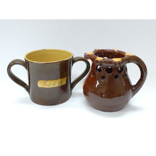 Two c1970's studio pottery slipware items including 'frog' mug and a ...