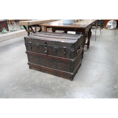 A Victorian metal bound shipping chest with fitted tray interior