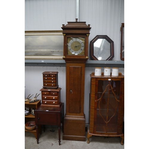 A George III oak cased longcase clock by Robert Davy of Hoveton, ornate ...