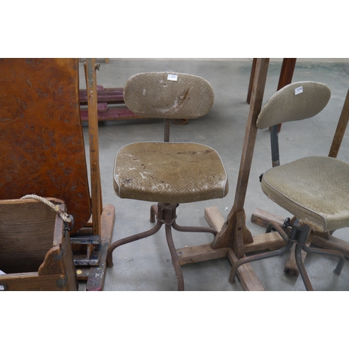 Three Tan-Sad industrial chairs