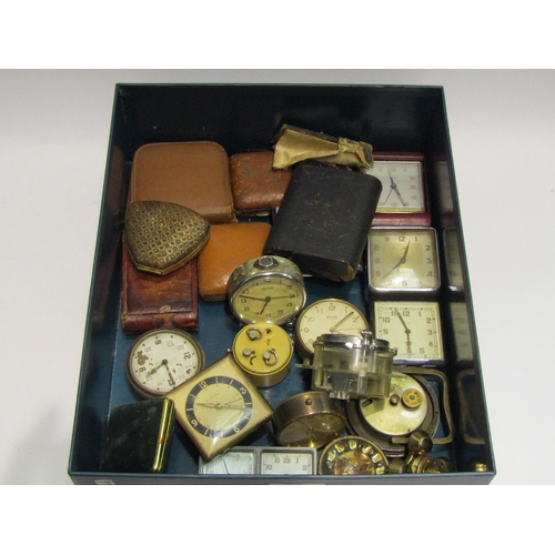 A collection of various travel clocks including Europa, Ingersoll ...