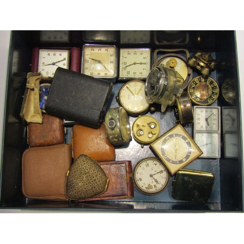 A collection of various travel clocks including Europa, Ingersoll ...