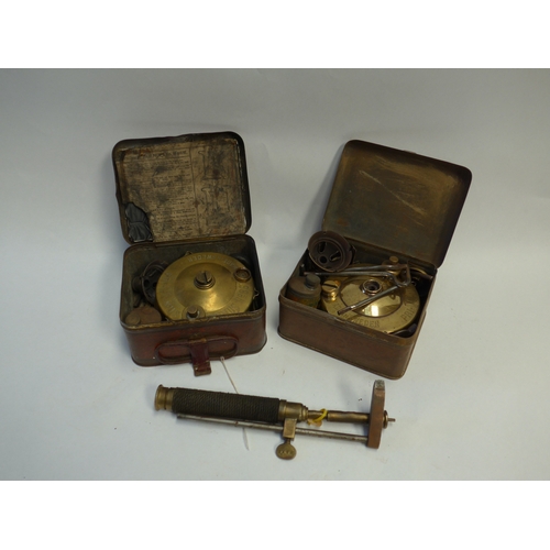Two tin cased Primus stoves and soldering iron