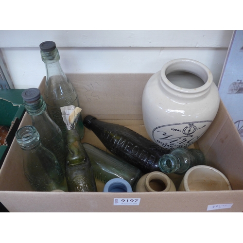 A box of glass bottles and jars including large Virol jar