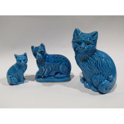 A Bourne Denby ceramic dog bowl, three blue ceramic cats and a white ...
