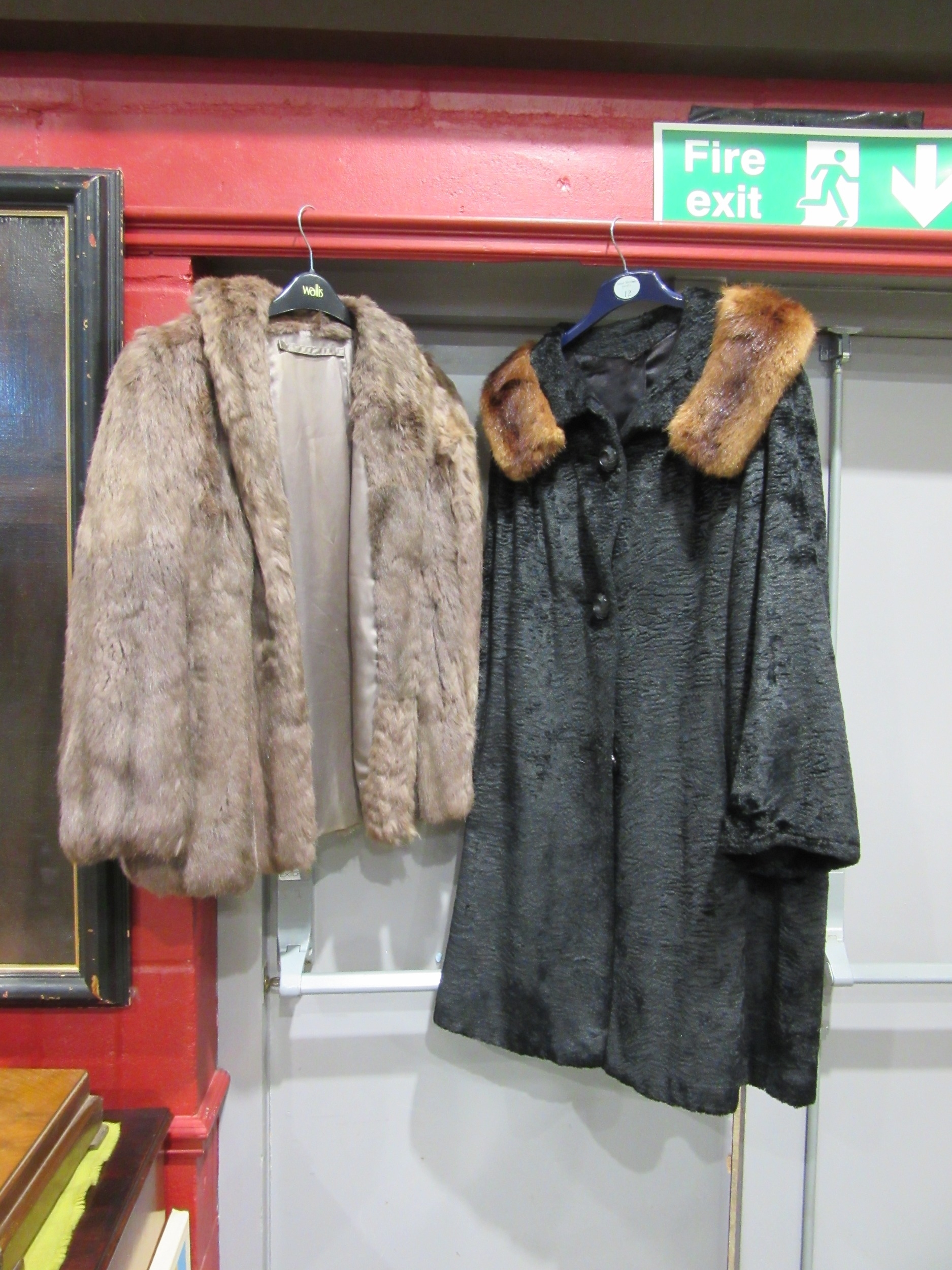 An Afghan coat with fox fur collar and a rabbit fur coat