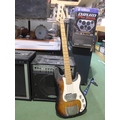 A Rowland Custom Shop electric bass guitar and Skytronic LG-60R 50W ...