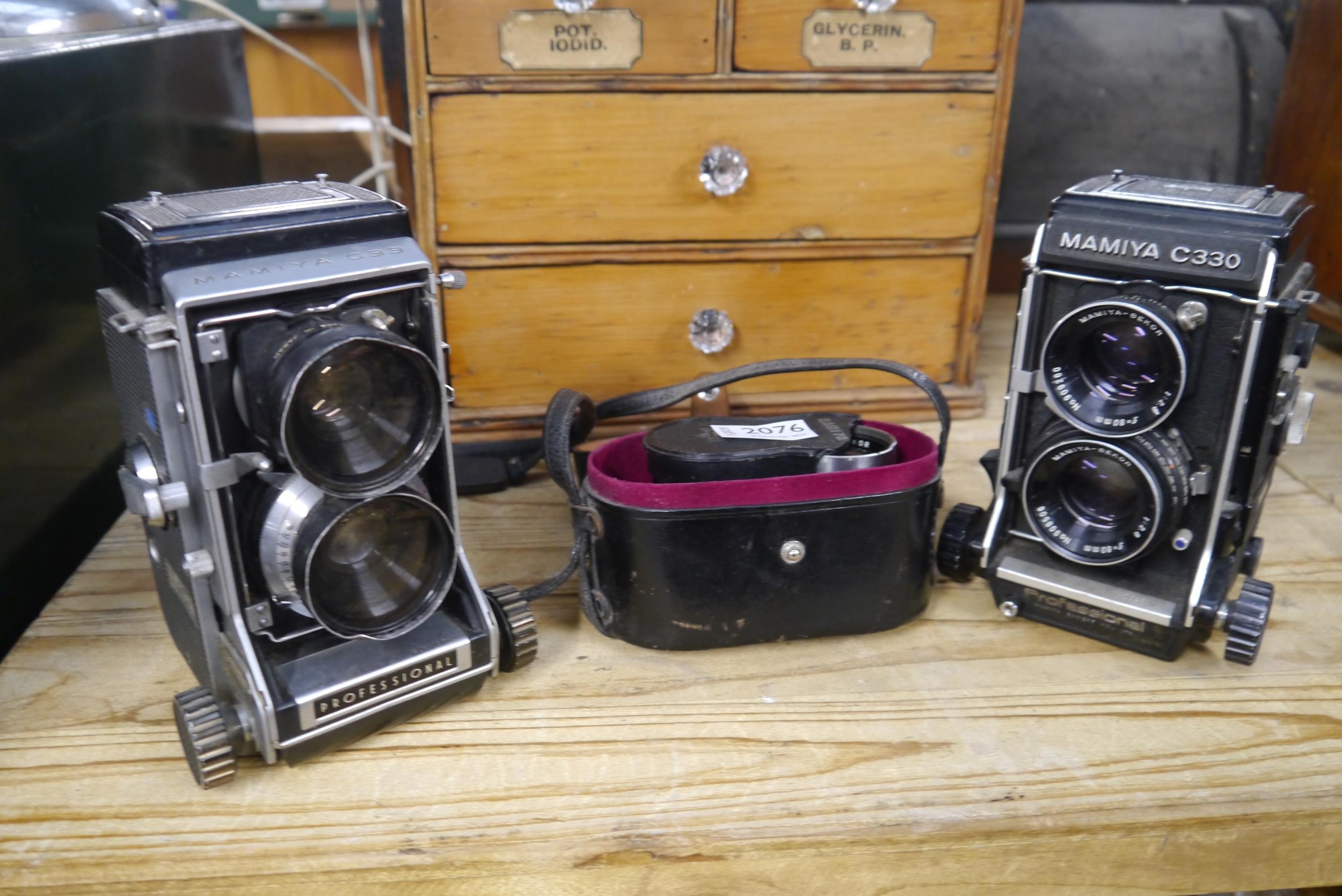 Two vintage MAMIYA cameras and a lense