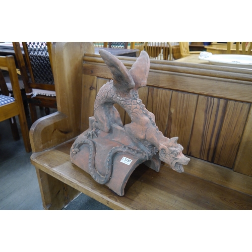A terracotta dragon roof finial
