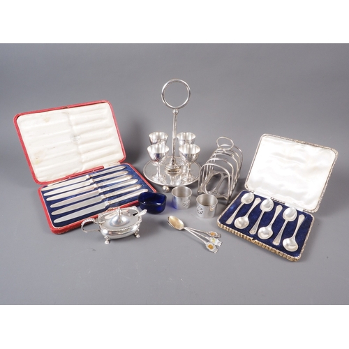 A silver mustard pot with blue glass liner and matched spoon, a set of ...