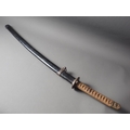 A Japanese military katana with plain design tsuba, in black painted ...