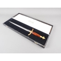 A Wilkinson Sword presentation poniard with hardwood handles, gilt ...