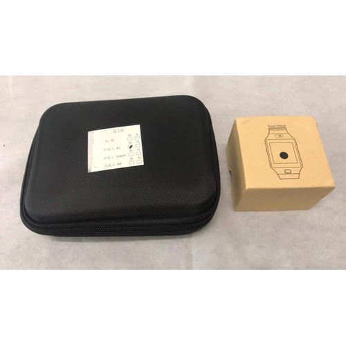 Rear horse mini drone in its protective case with control and instructions plus a smart watch