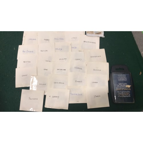 Collection of world wide stamps and top trumps