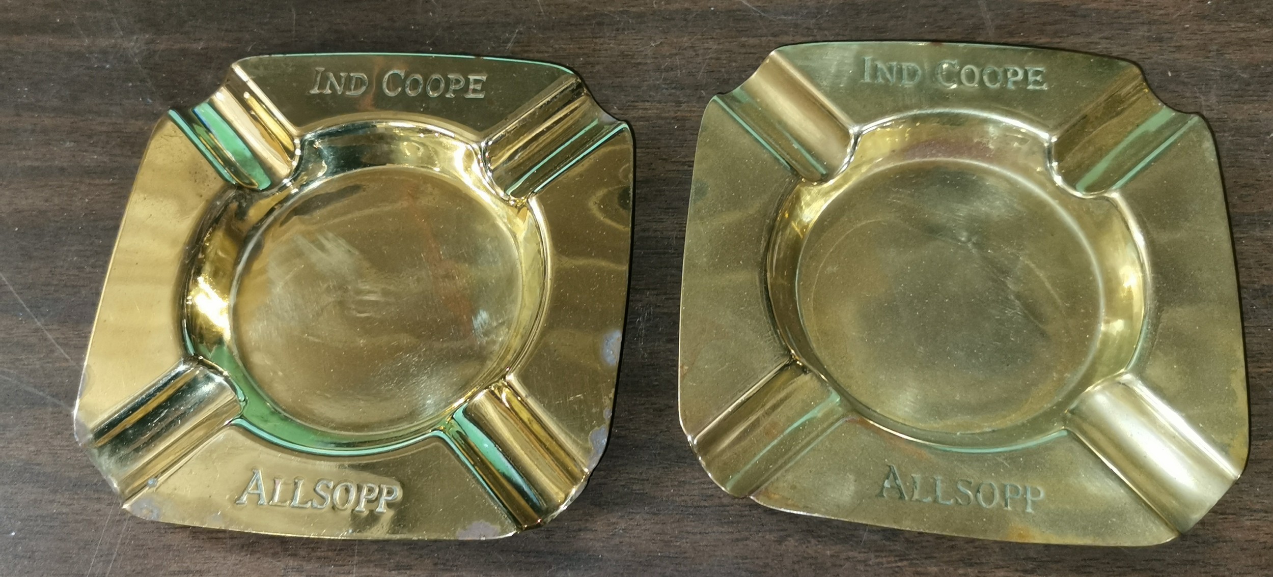 Pair of brass Ind Coope Allsopp advertising pub ashtrays