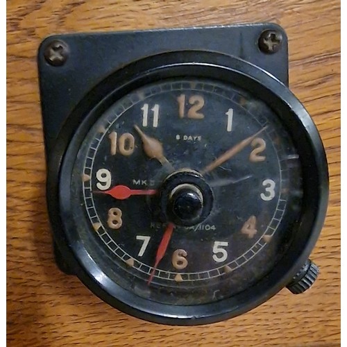 Working clock from Spitfire fighter plane, on bespoke oak mount stand