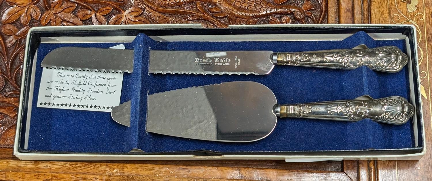 Boxed vintage cake knife and server set with hallmarked silver handles